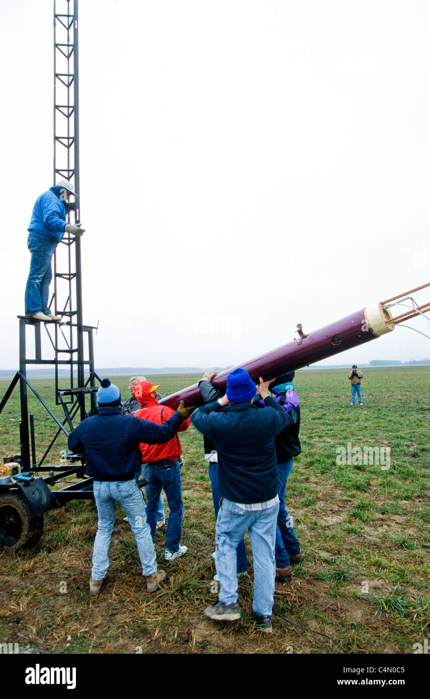 Dennis Lemot attaches his rocket to his launch platform at an amateur ...
