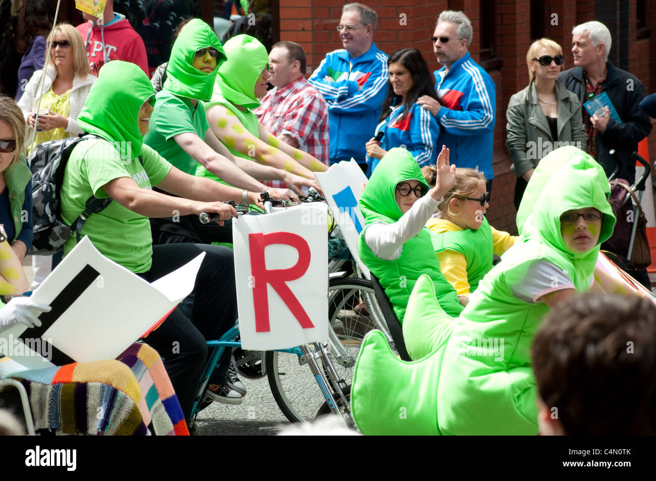 Participants in the 2nd Manchester Parade entertain onlookers as the ...