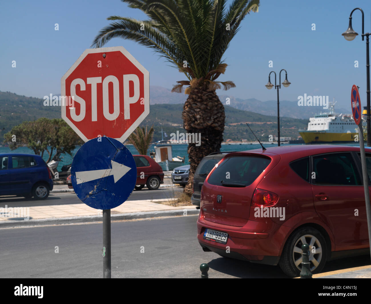 Samos Greece Cars By A Stop Sign Stock Photo - Alamy
