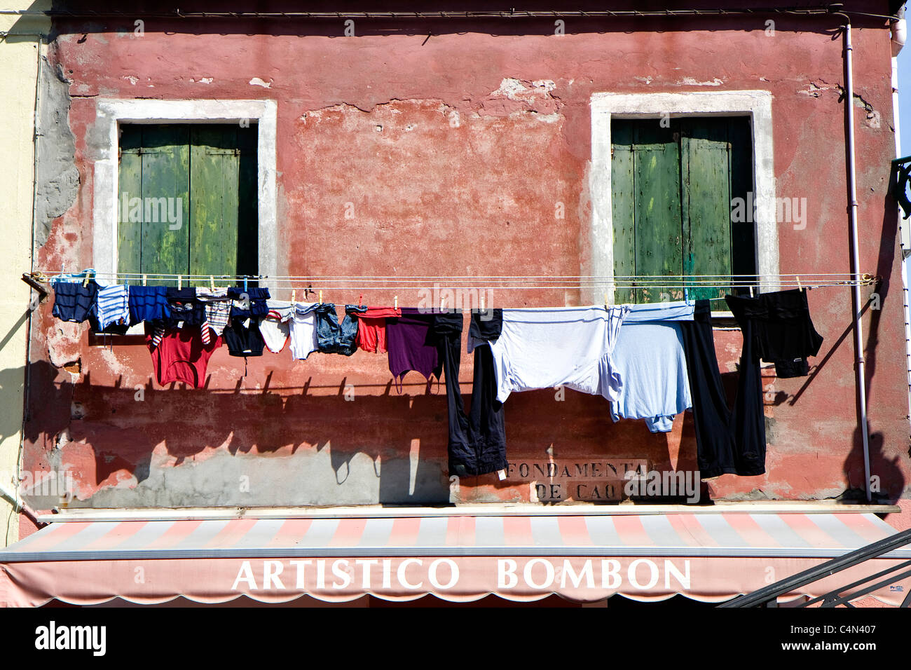 Typical Italian house wall at Burano island next to Venice in Italy ...