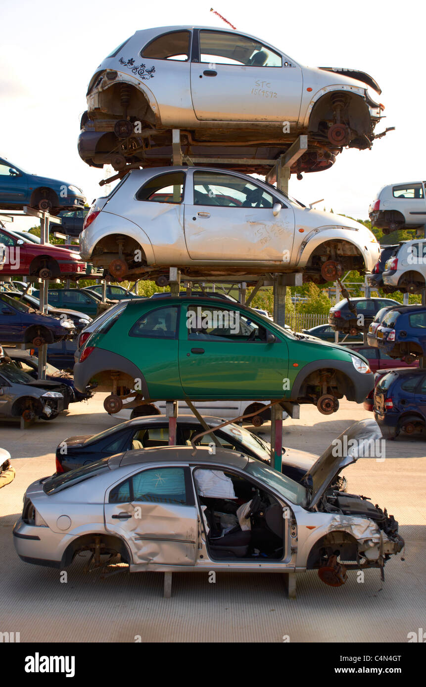 Cars stacked up in a scrapyard Stock Photo - Alamy