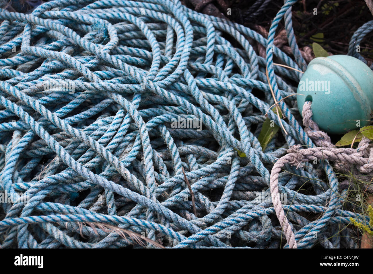 Pile of fishing rope in Mullion harbour on the Lizard Peninsula ...