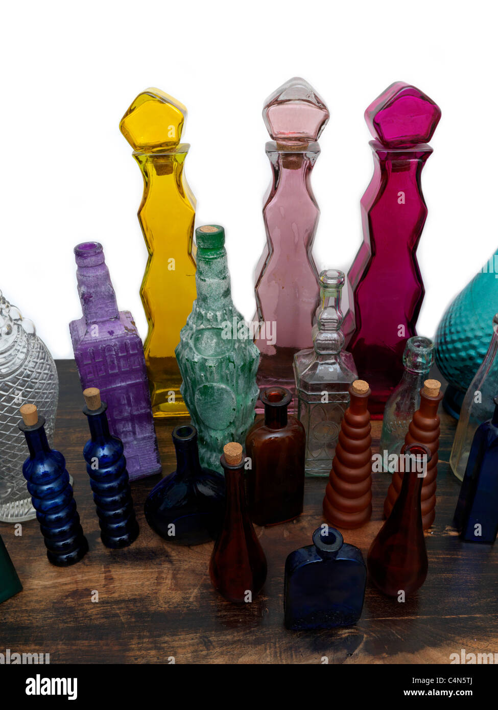 A Collection Of Glass Bottles All Different Shapes, Sizes And Colours ...