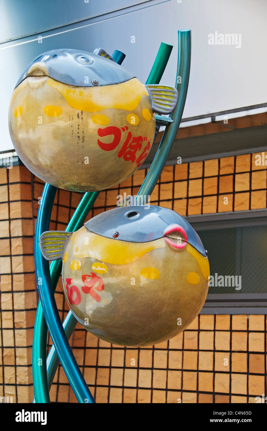 Beautiful puffer fish art sculpture outside a building in the Shin ...