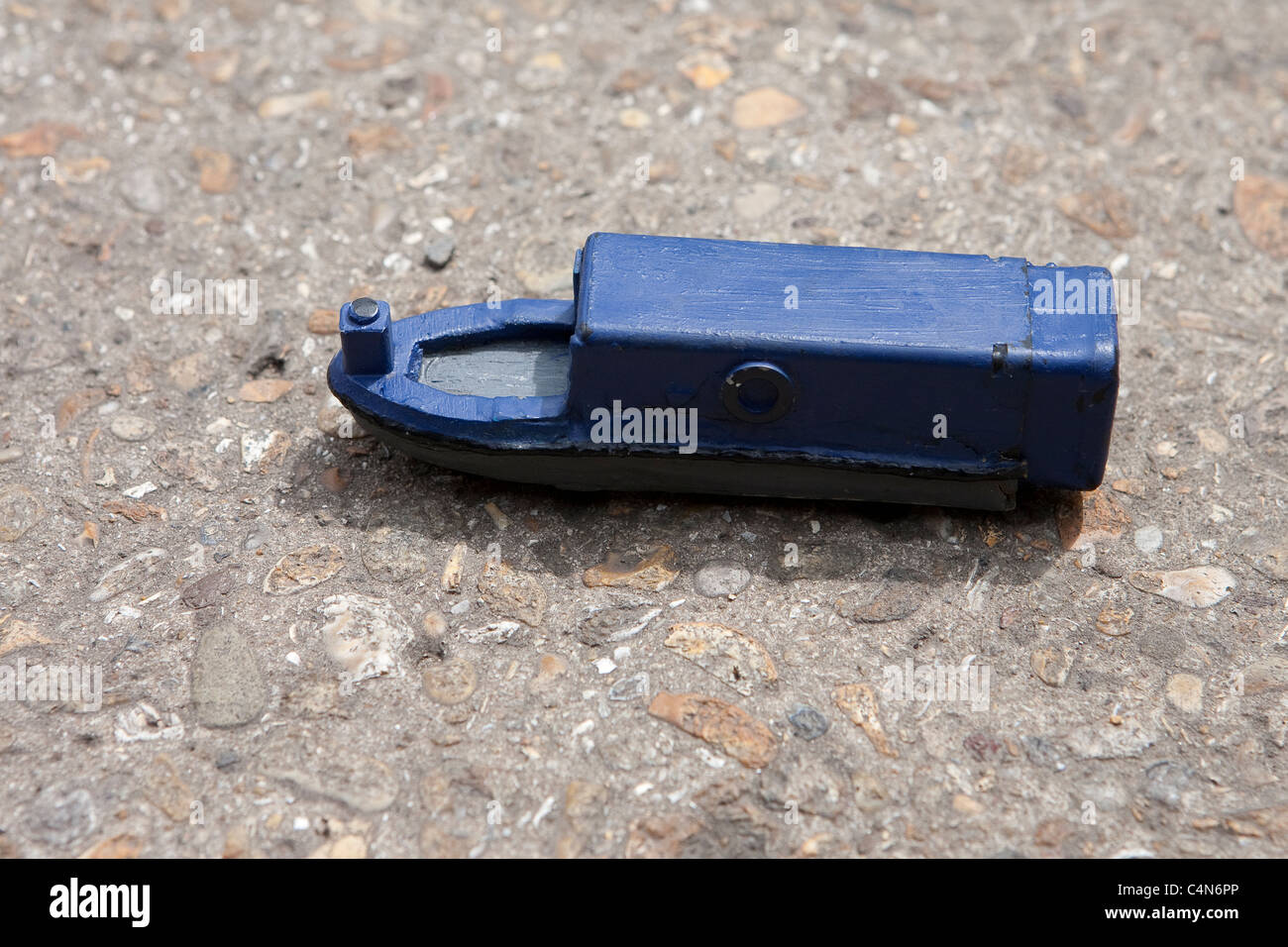 A boat-shaped micro-cache placed on the ground Stock Photo - Alamy