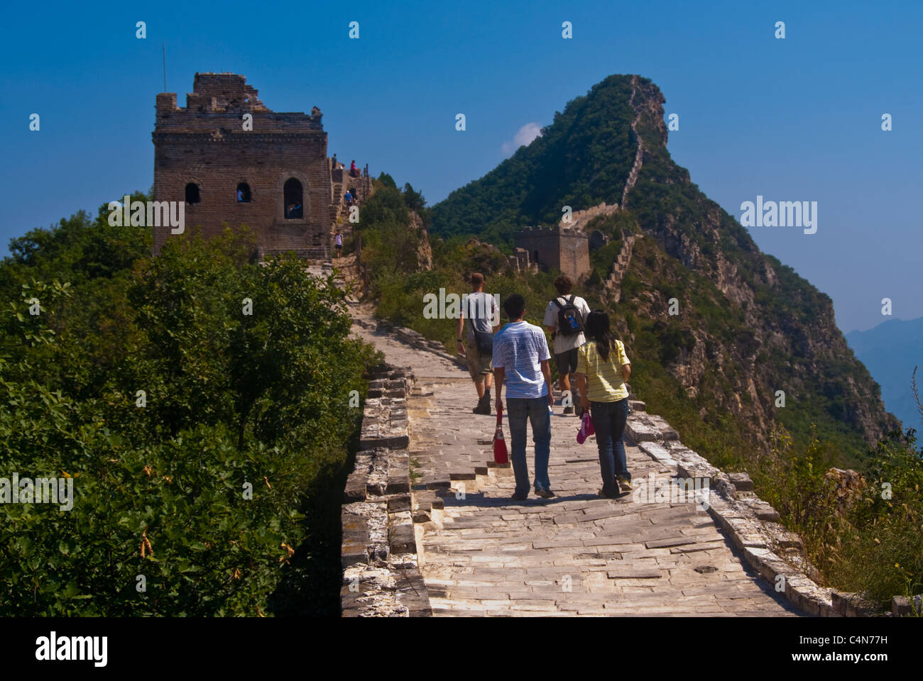 Chinese figure walks hi-res stock photography and images - Alamy