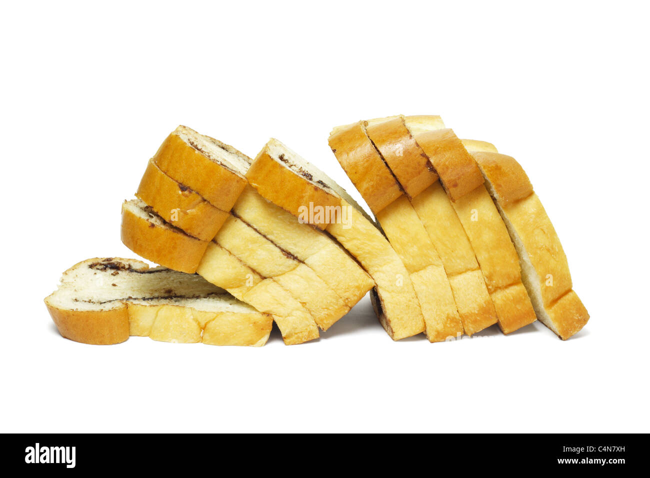 Loaf of sliced chocolate loaded bread on white background Stock Photo ...