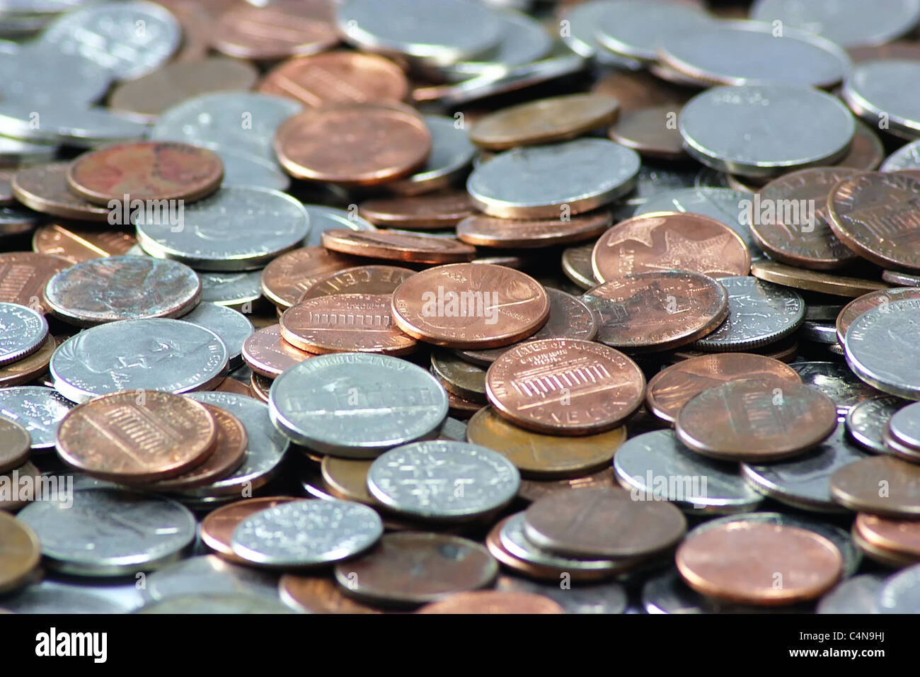 A large bed of assorted change Stock Photo - Alamy