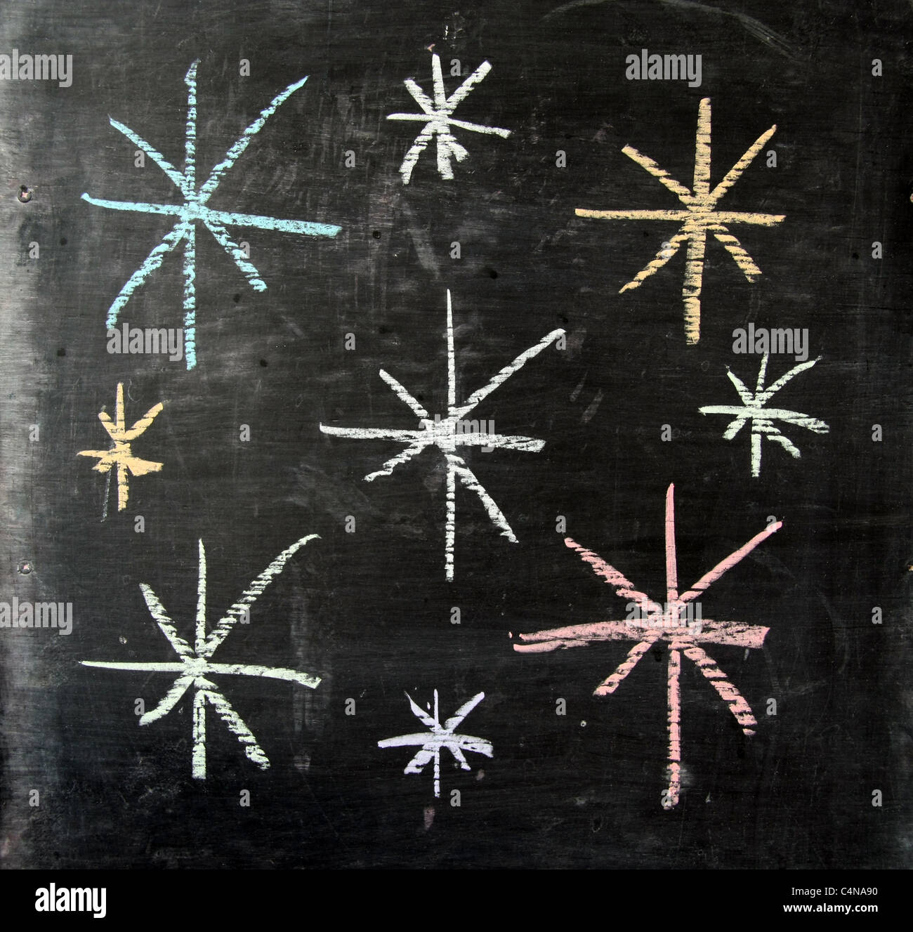 colourful chalk stars on child's blackboard Stock Photo - Alamy