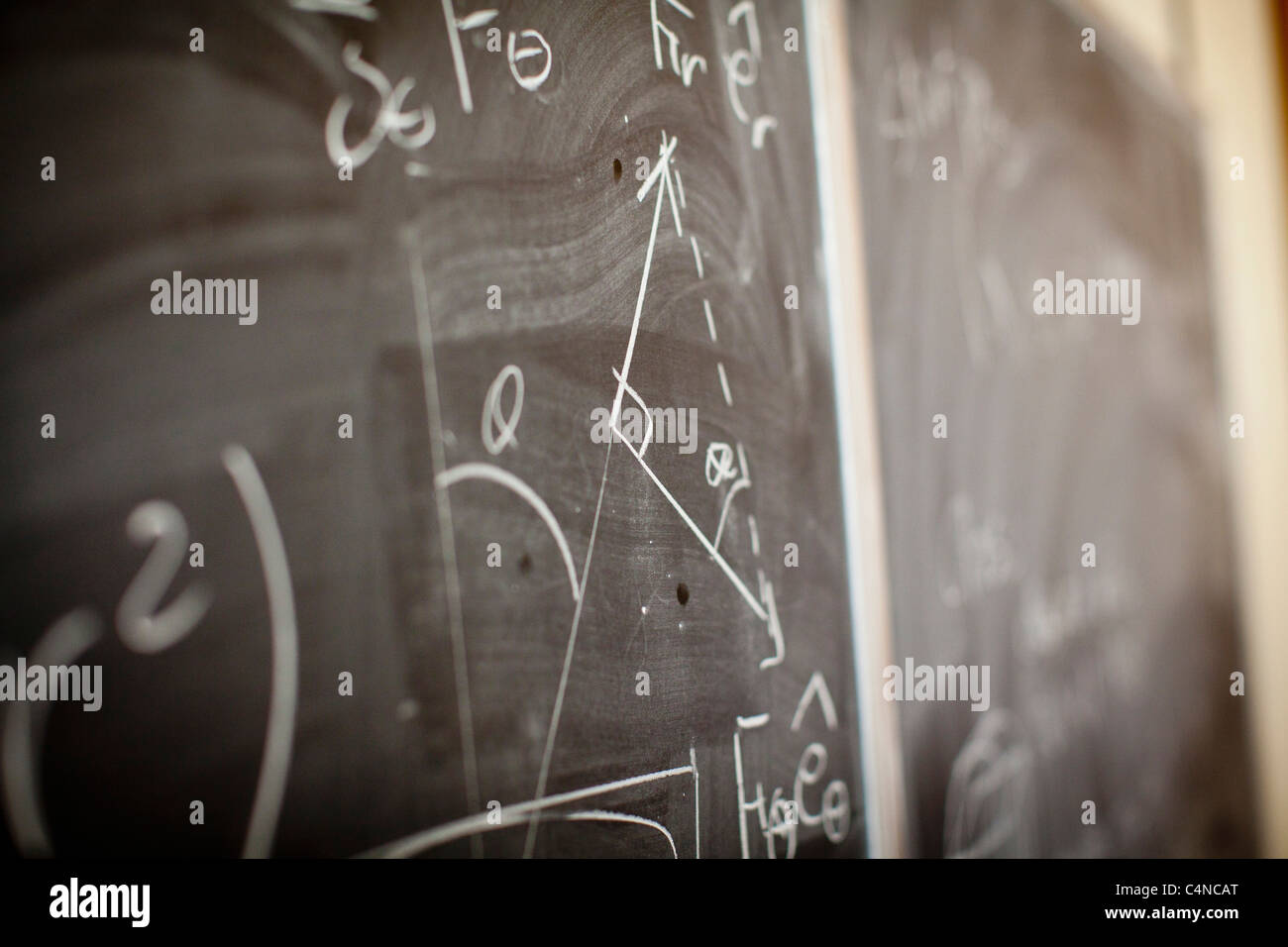 Math formula on blackboard Stock Photo - Alamy