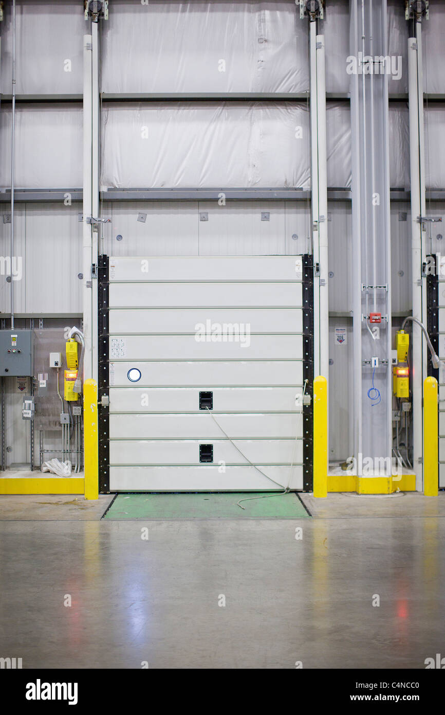 Warehouse delivery door Stock Photo - Alamy