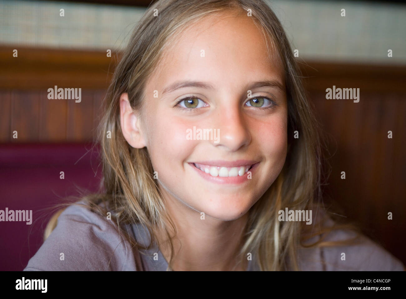 Portrait of a 10-year-old girl smiling Stock Photo - Alamy
