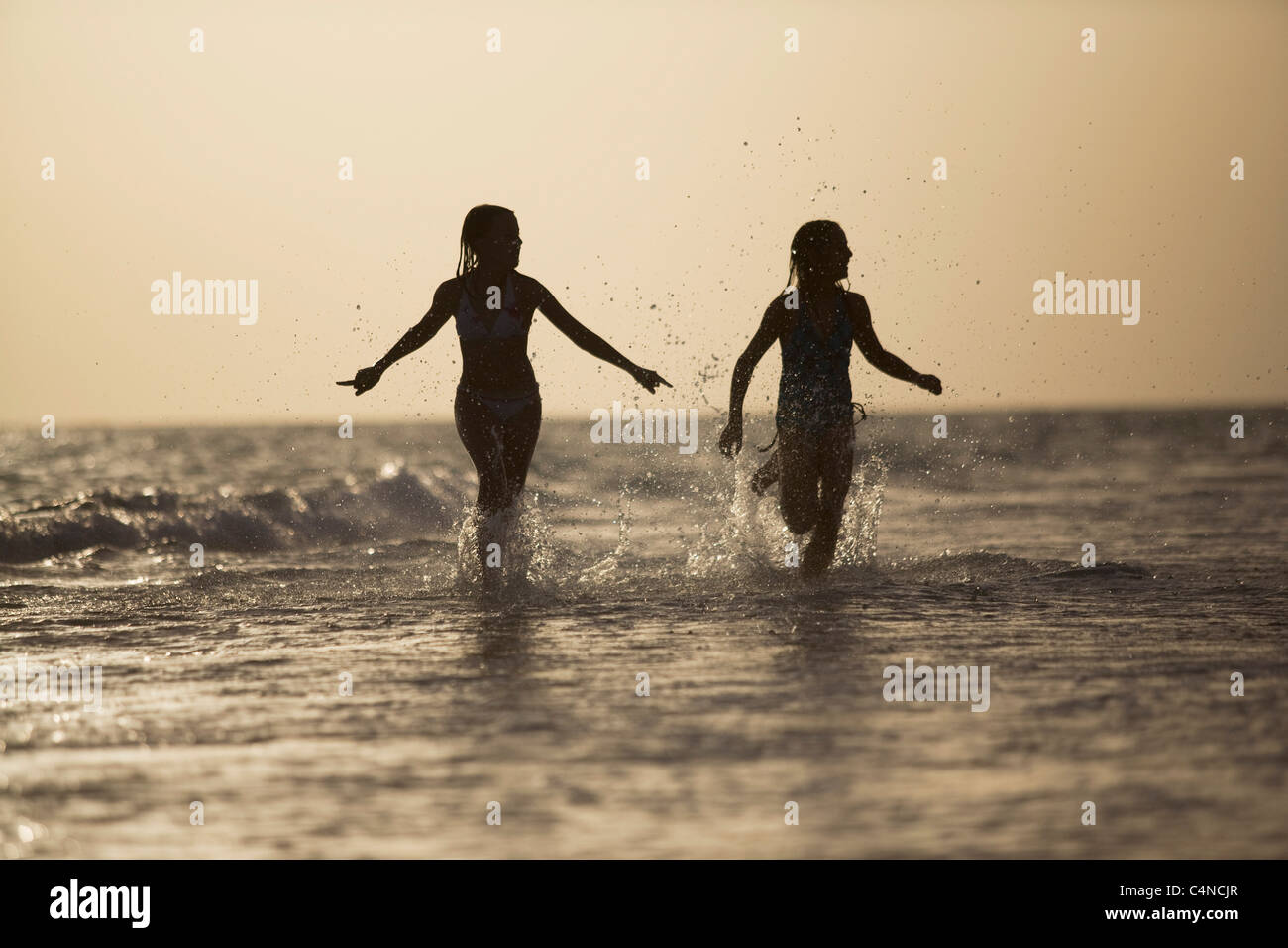 Girl running water attraction hi-res stock photography and images - Alamy