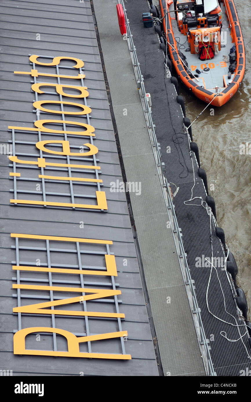 RNLI lifeboats sign with part of a RNLI lifeboat in the top corner ...