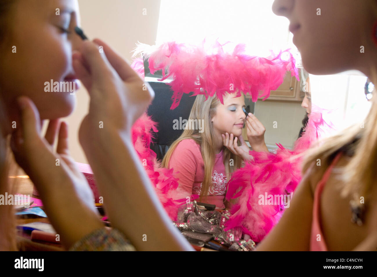 Two girls playing with make up at home Stock Photo - Alamy