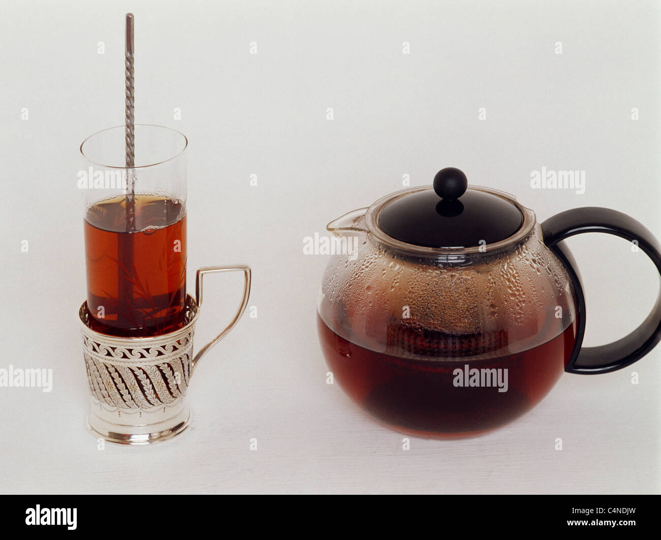 Black Tea & Glass Teapot Stock Photo - Alamy