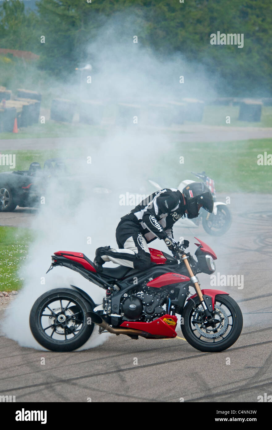 Motorcycle stunt hi-res stock photography and images - Alamy