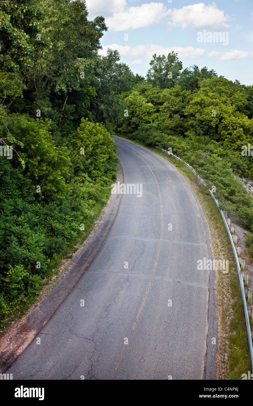 Curved highway with a single lane Stock Photo - Alamy