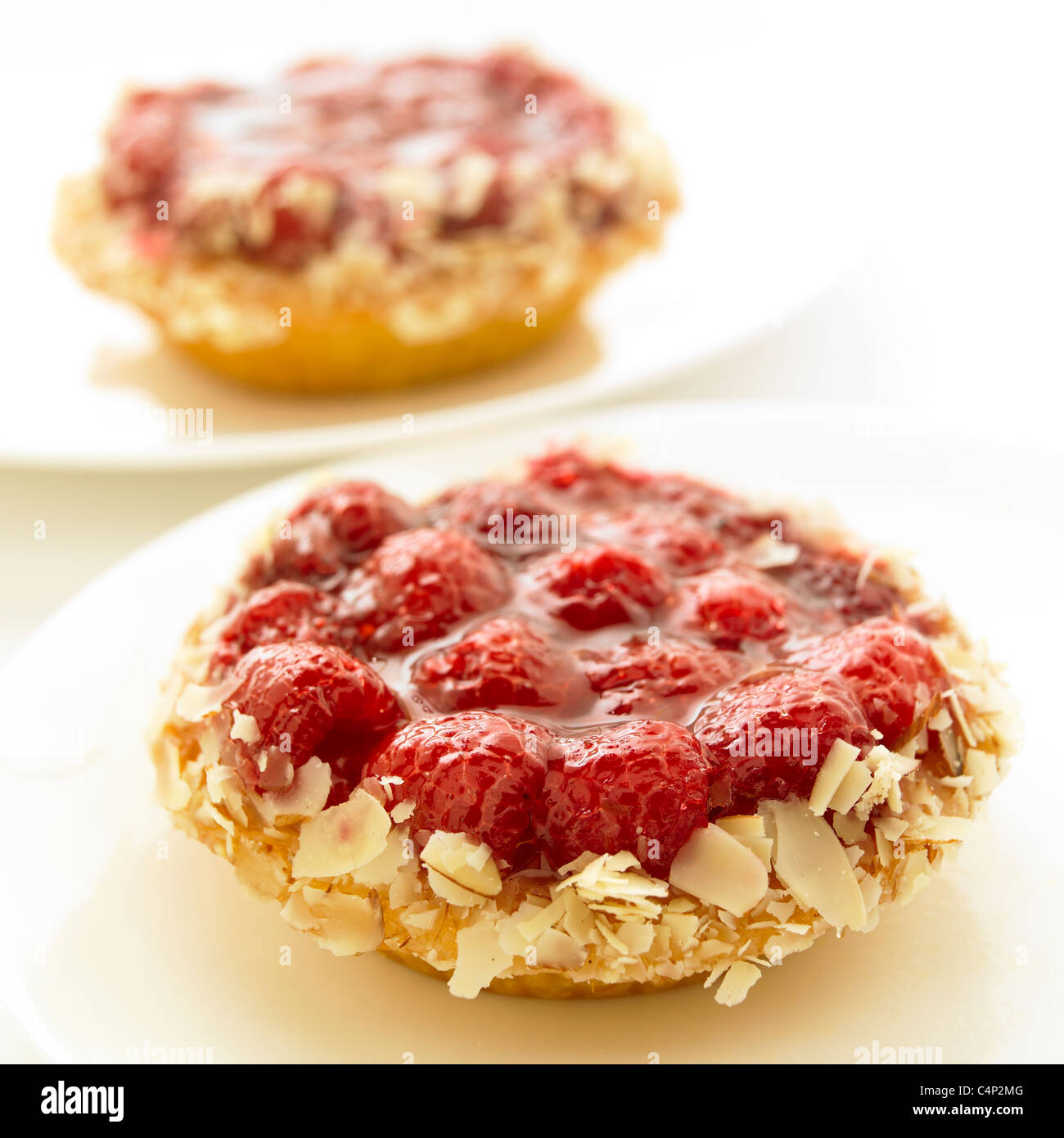 Two raspberry tarts hi-res stock photography and images - Alamy