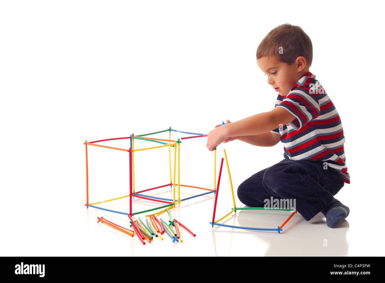A 4-year-old boy building a structure Stock Photo - Alamy