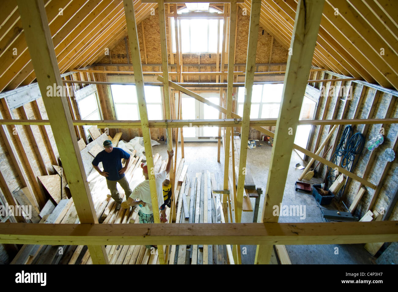 Carpenter standing in a cabin construction project Stock Photo - Alamy