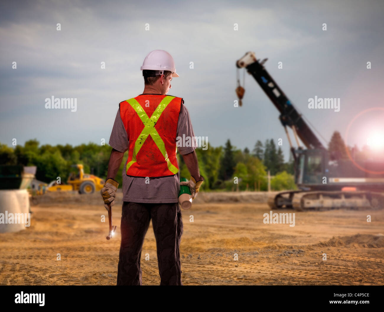 Construction worker in early morning Stock Photo - Alamy
