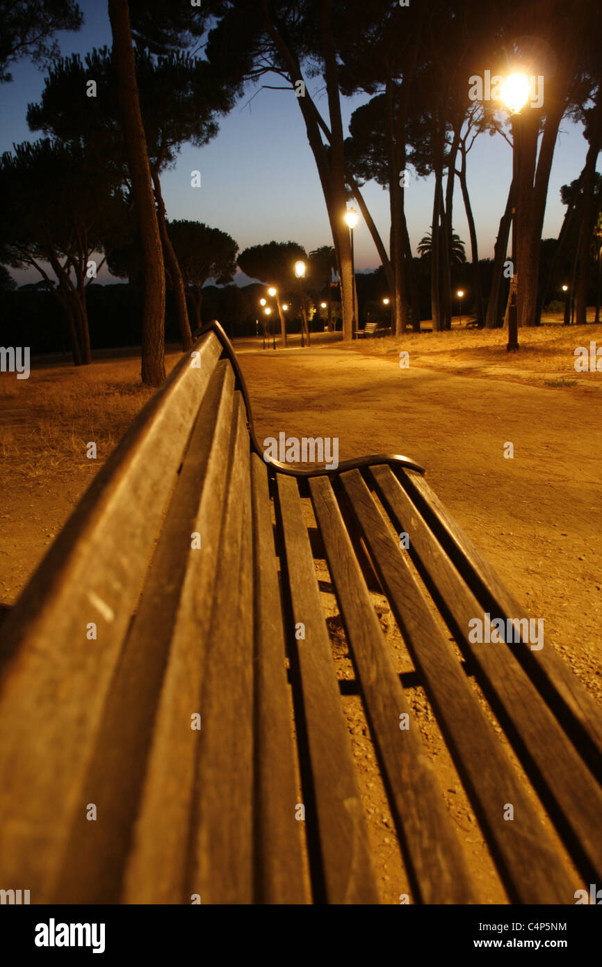 empty bench in villa pamphili park in rome at night Stock Photo - Alamy