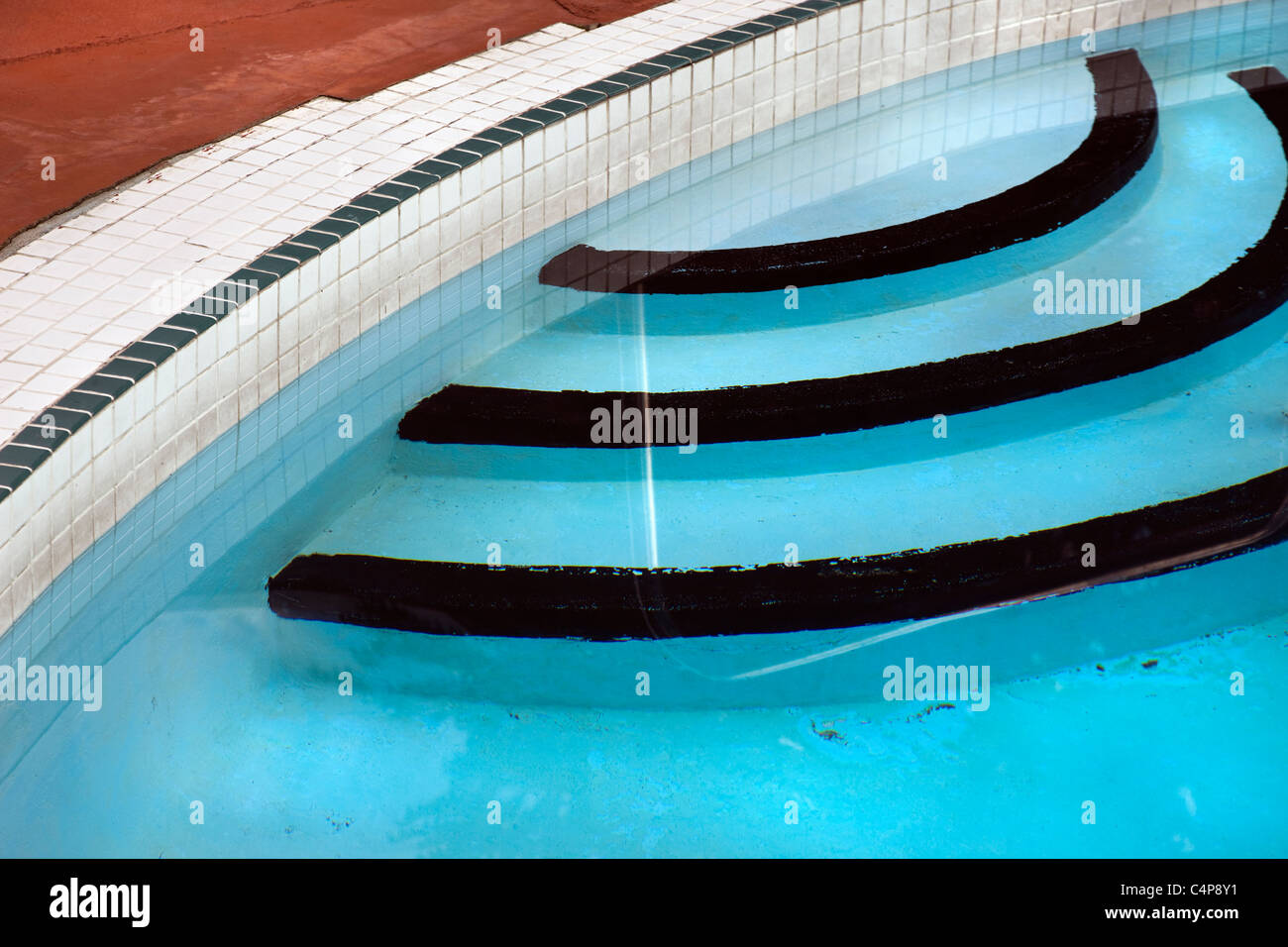 Steps in a swimming pool Stock Photo - Alamy