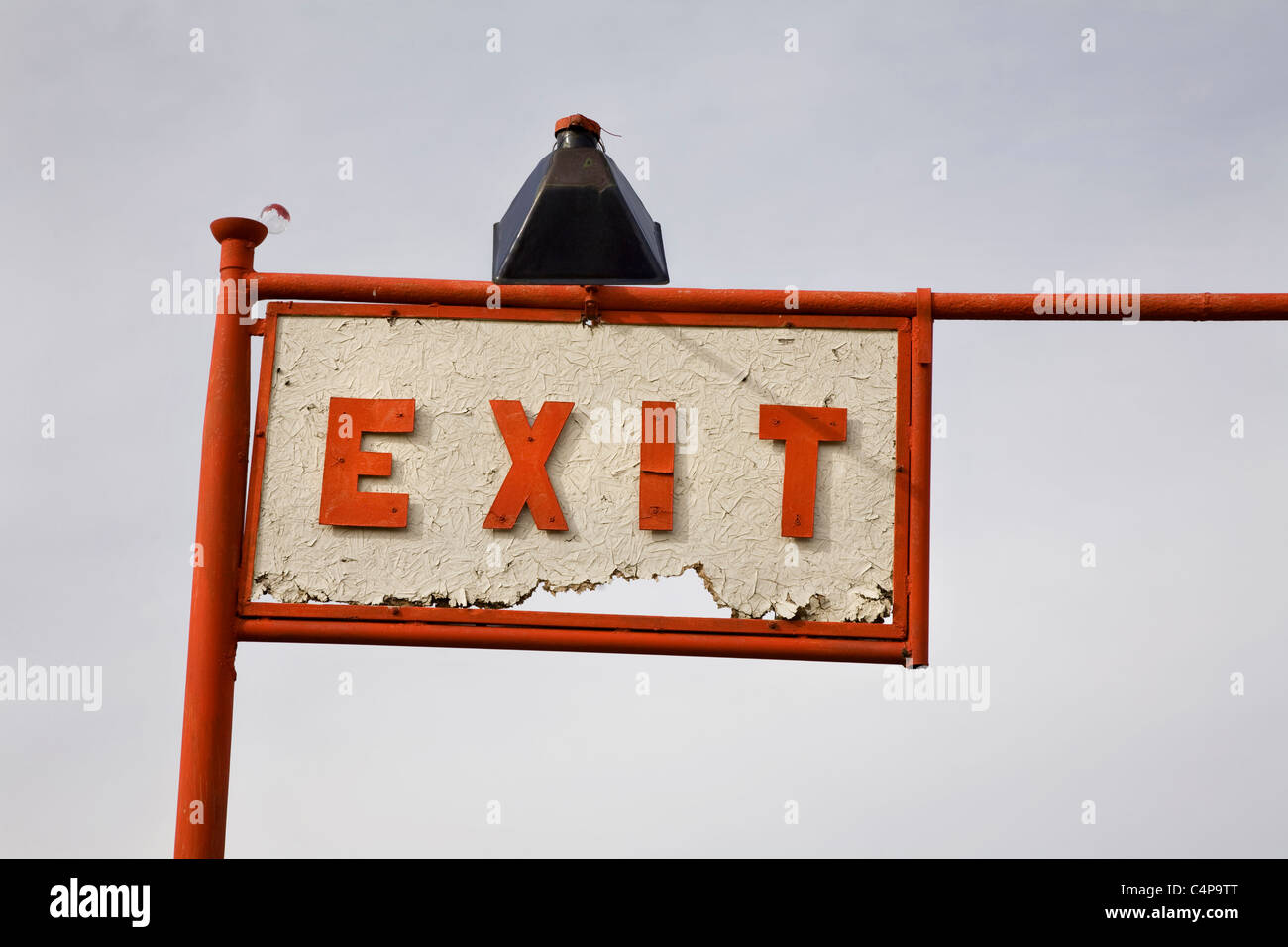 Worn out exit sign Stock Photo - Alamy