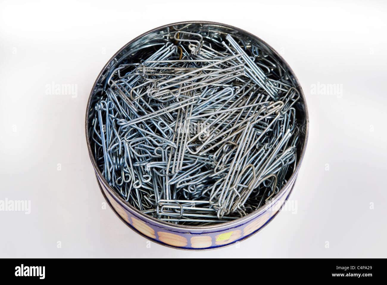 Can full of pins Stock Photo - Alamy