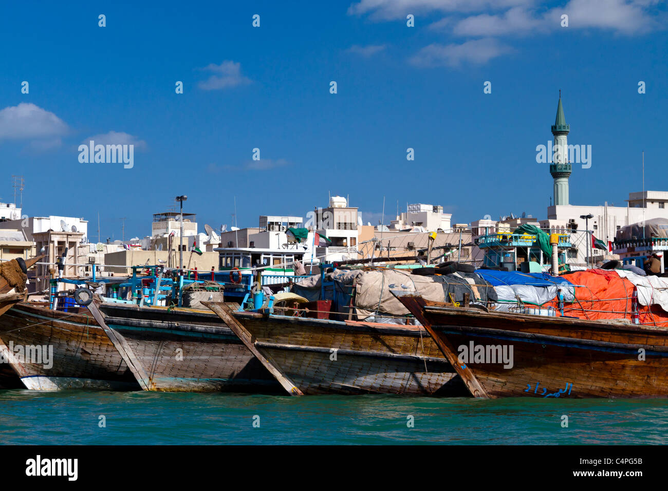 Large wooden dow boats loaded with cargo in dubai Creek, Dubai, UAE ...