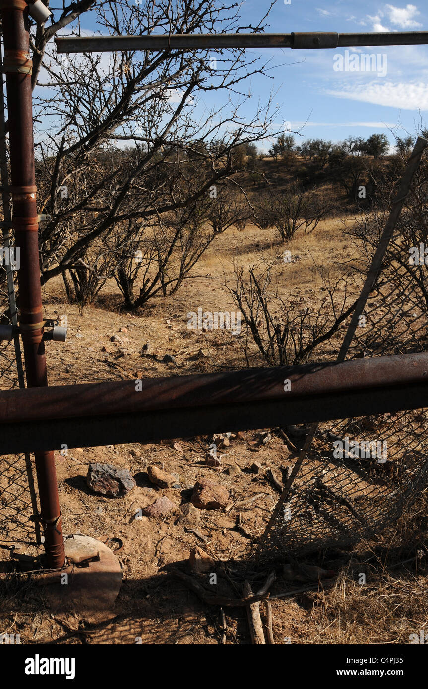 Holes cut in the fence at the Mexican border between Sonora and Lochiel ...