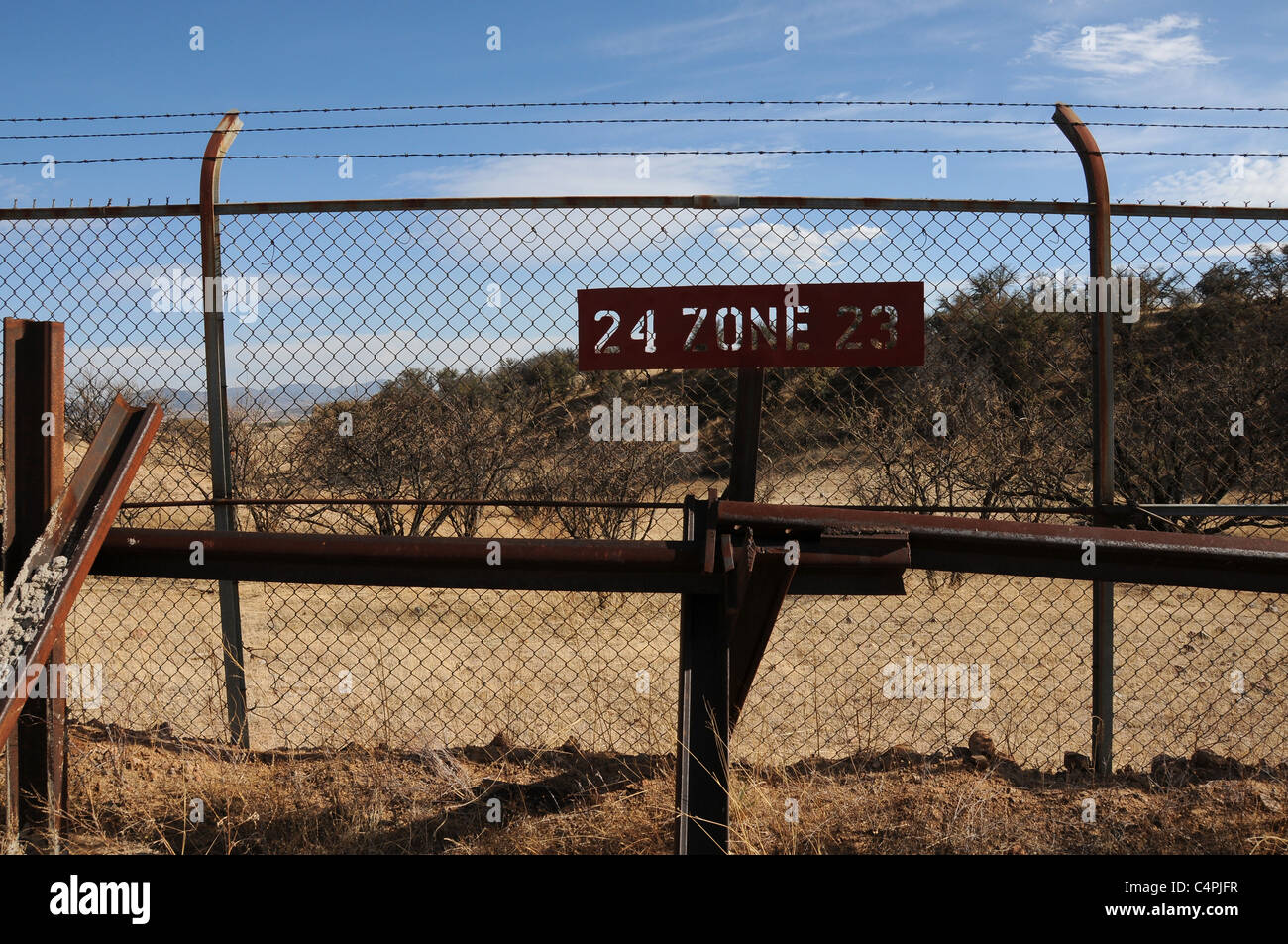 Holes cut in the fence at the Mexican border between Sonora and Lochiel ...