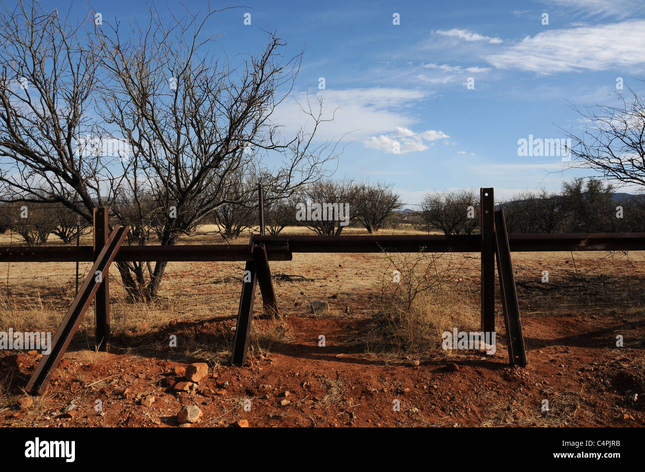 Holes cut in the fence at the Mexican border between Sonora and Lochiel ...
