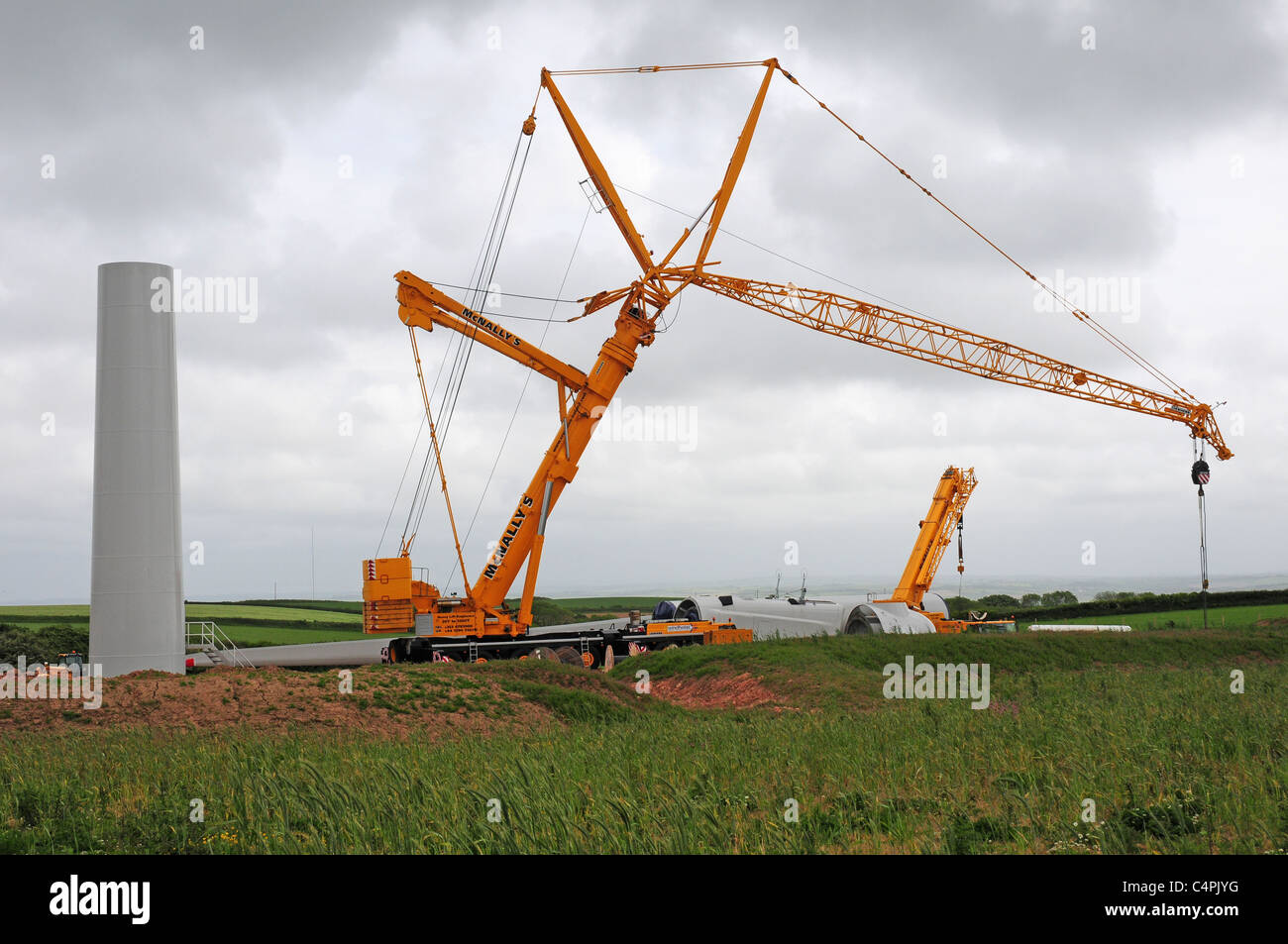 Wind turbine awaiting construction. Crane positioned for use ...