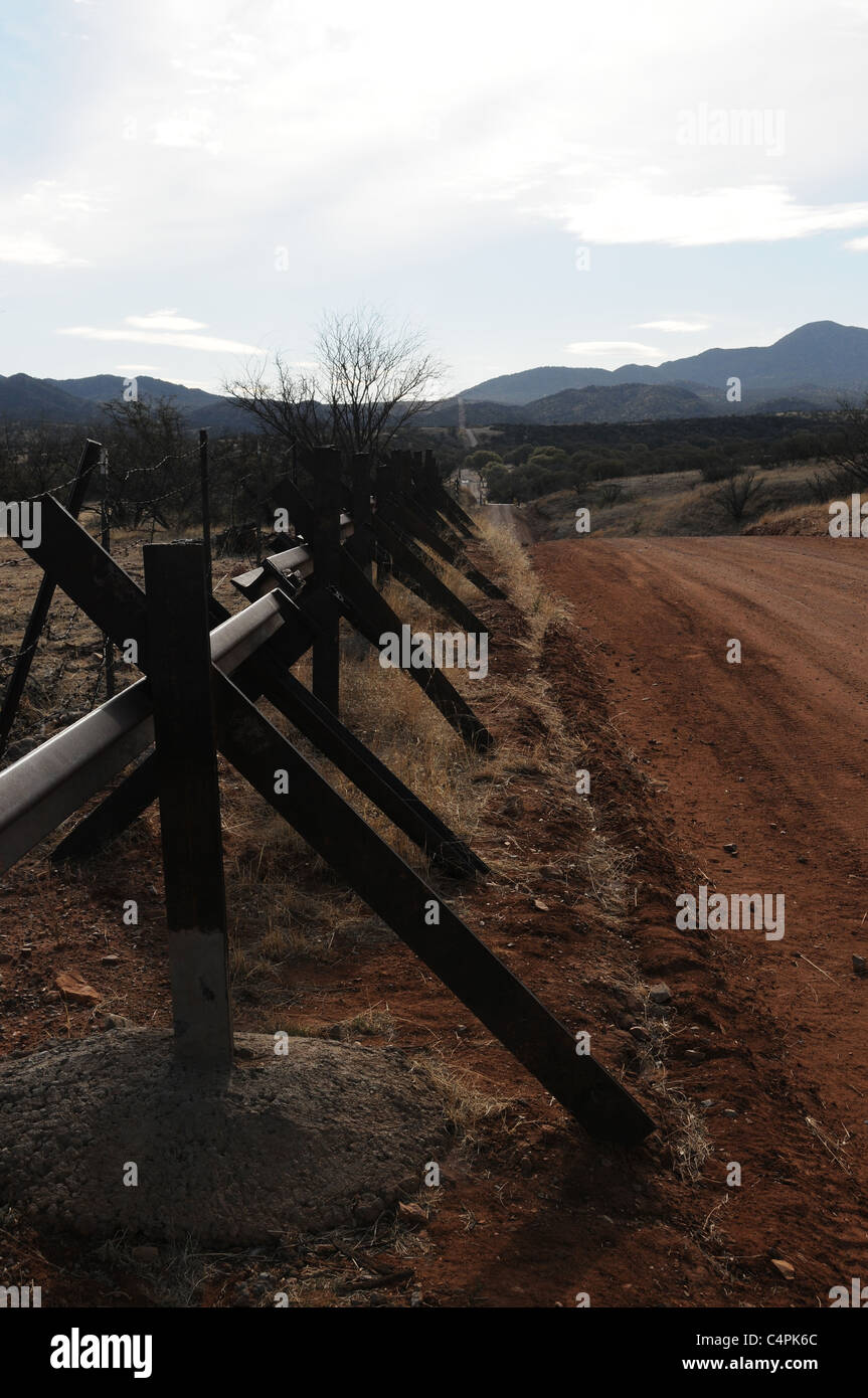 Holes cut in the fence at the Mexican border between Sonora and Lochiel ...