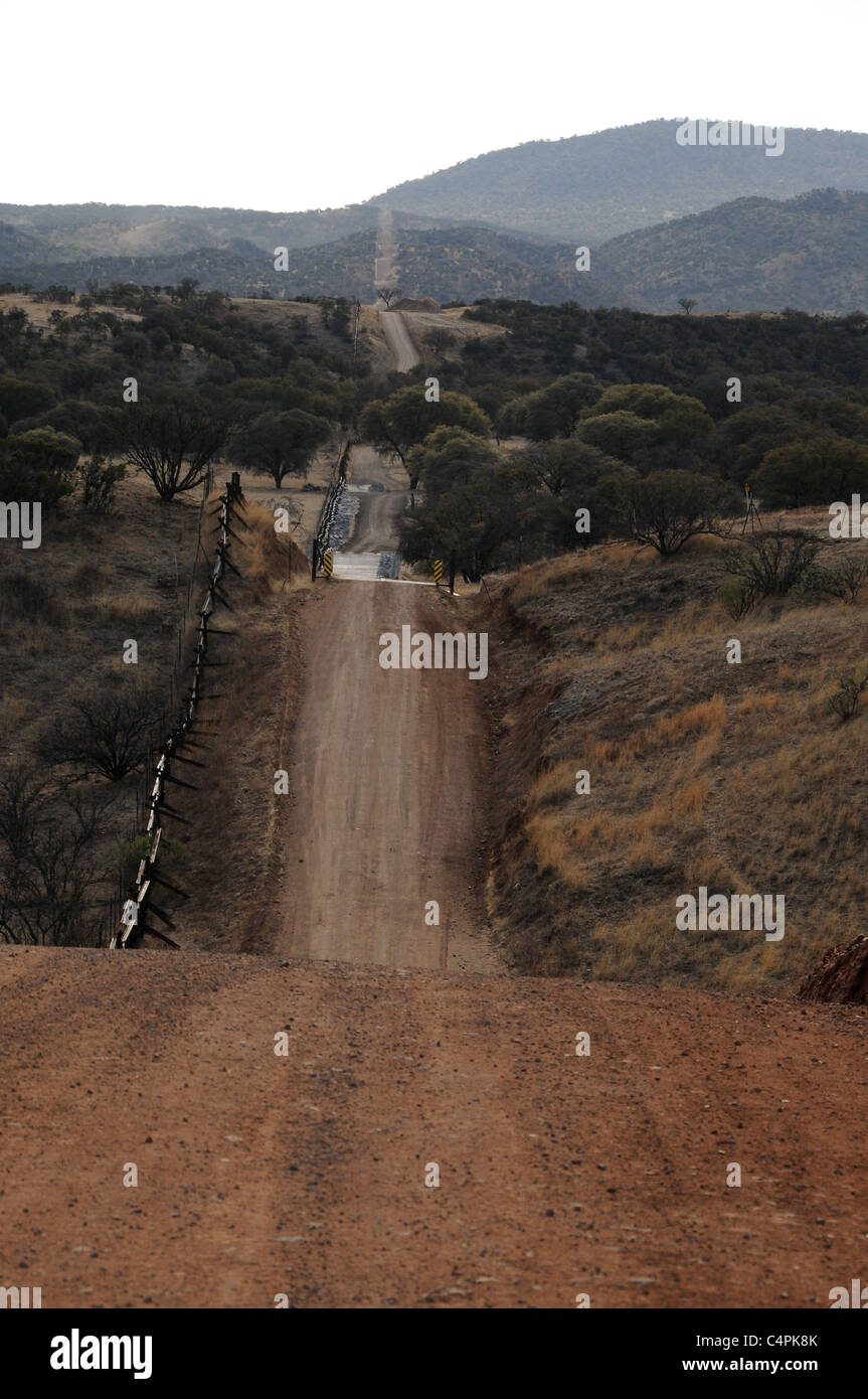 Holes cut in the fence at the Mexican border between Sonora and Lochiel ...