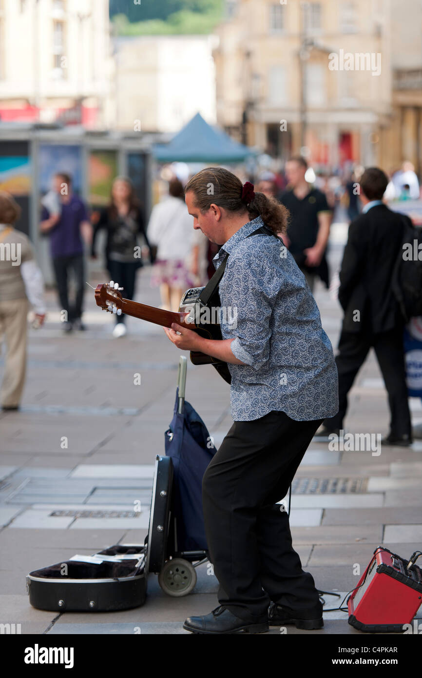City center busker hi-res stock photography and images - Alamy