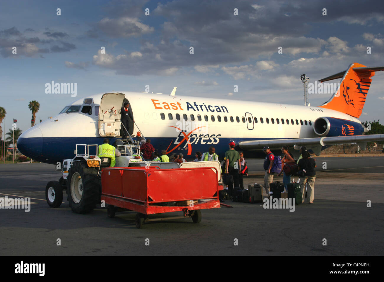 East African Express plane passengers boarding Stock Photo - Alamy