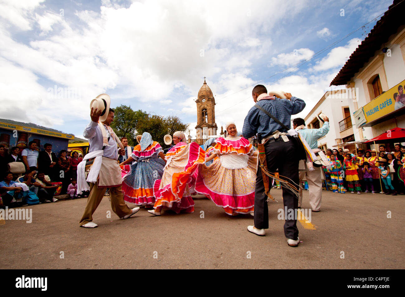 Dancers of Nobsa Dance Group performing outside a traditional dance ...