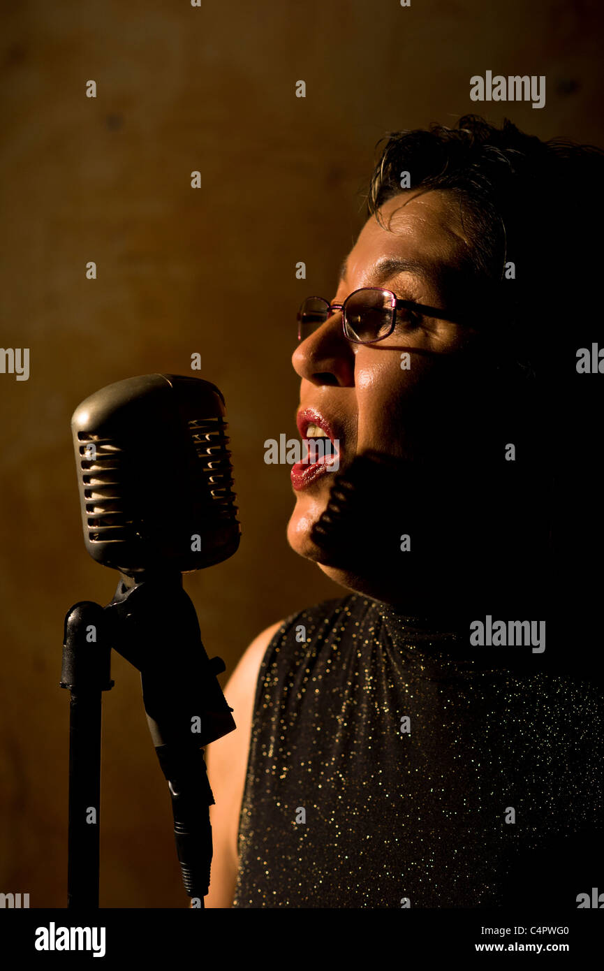 Female singer performing at jazz club hi-res stock photography and ...