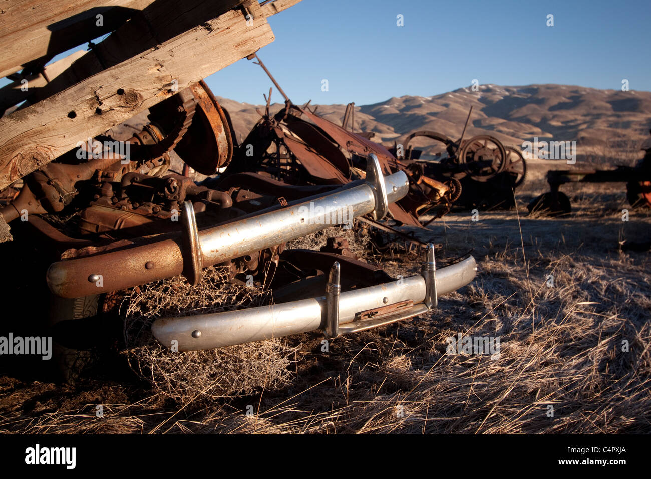 old junk in a field Stock Photo - Alamy