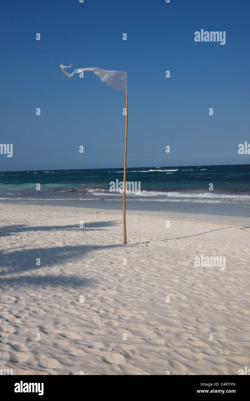 white flag on beach Stock Photo - Alamy
