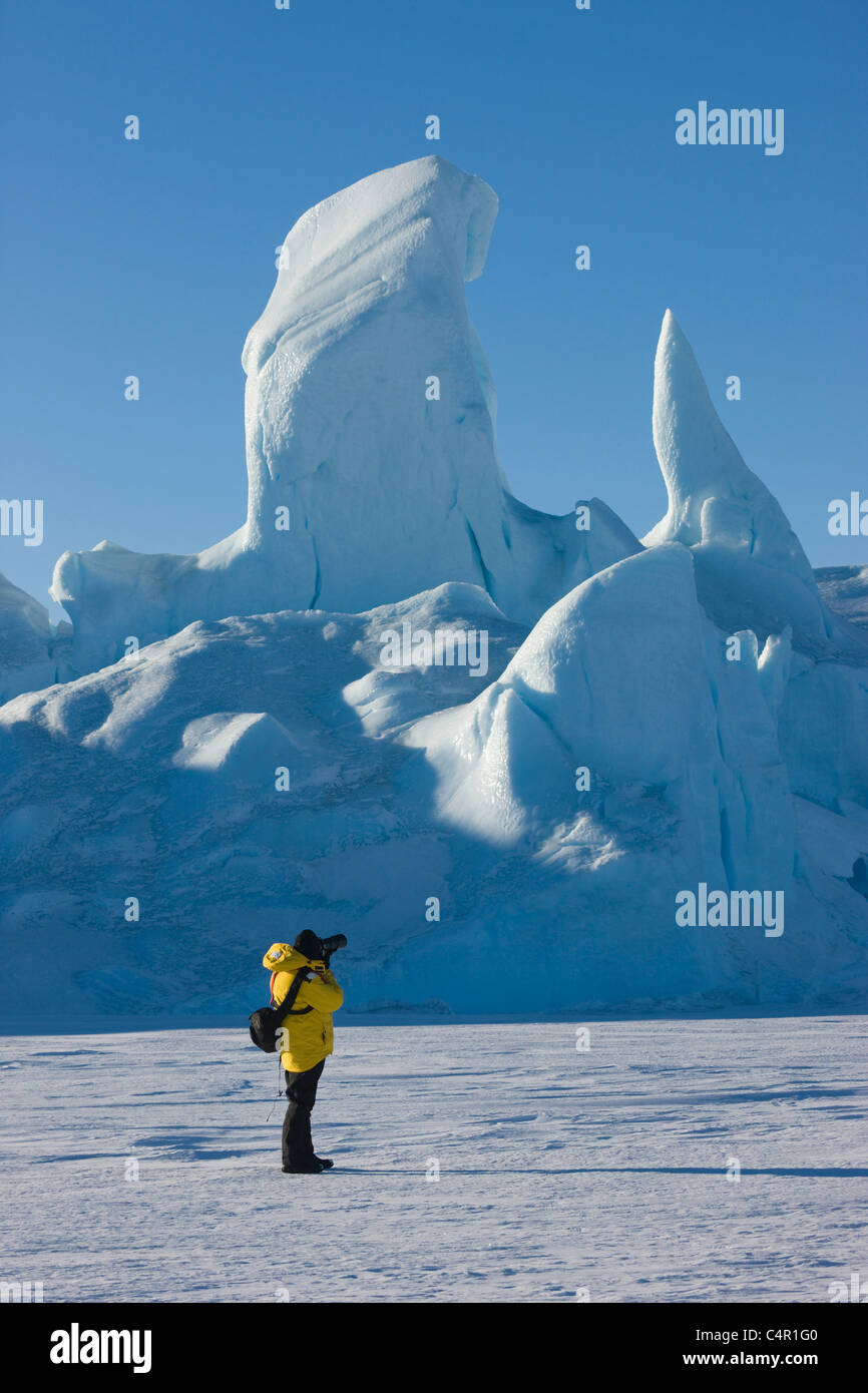 Tourist photographing iceberg, Snow Hill Island, Antarctica Stock Photo ...