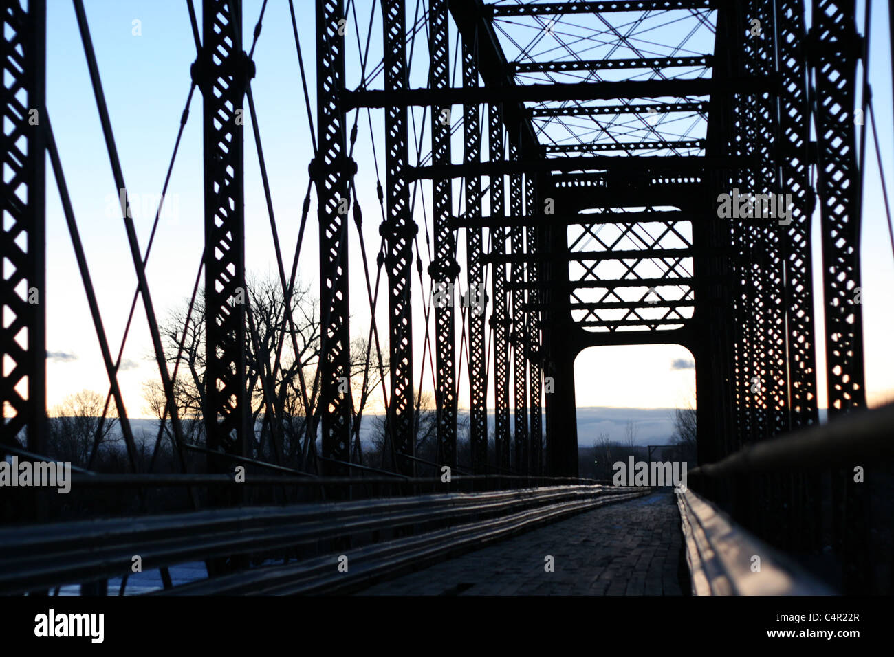 Looking down a bridge at dusk Stock Photo - Alamy
