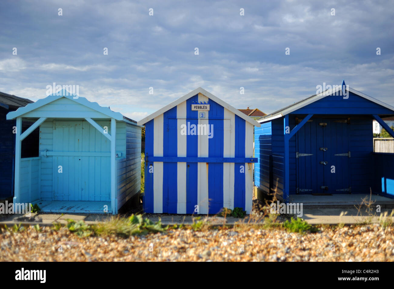 Beach huts on the beach at Ferring near Worthing West Sussex UK shot in ...