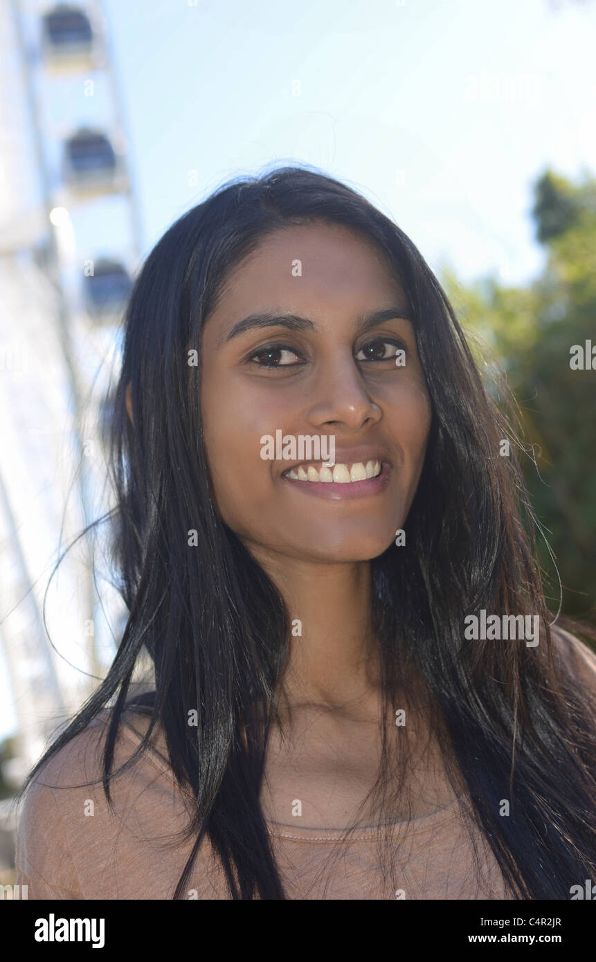Beautiful smiling lady dark hi-res stock photography and images - Alamy