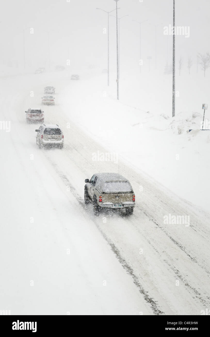 Car driving in snowstorm hi-res stock photography and images - Alamy