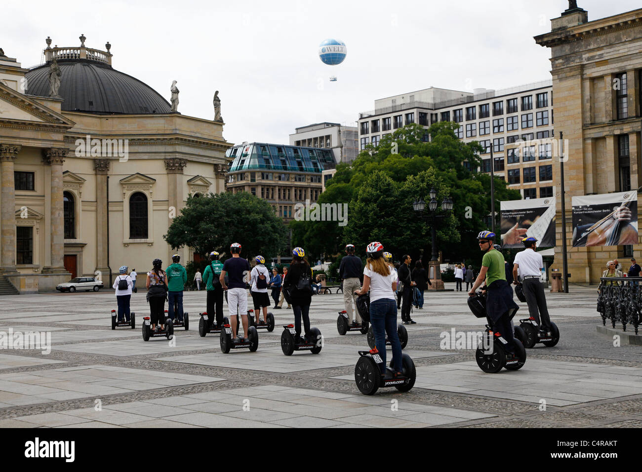 A group of tourists on a Segway two-wheeled, self-balancing personal ...