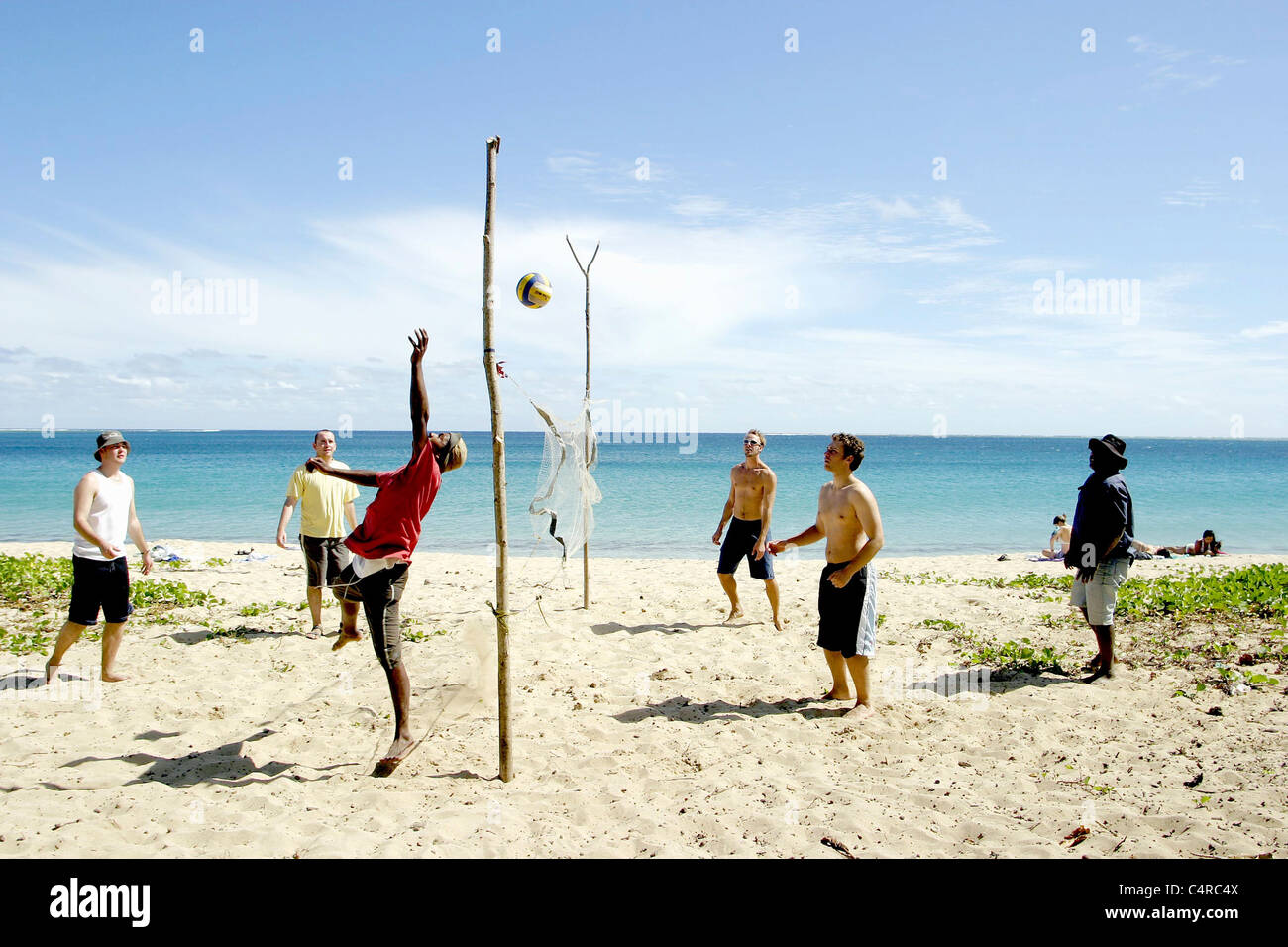 A group plays beach volleyball, Nandi, Fiji Stock Photo - Alamy
